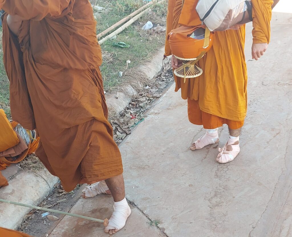 The Monk's Long March • EXPLORE LAOS People